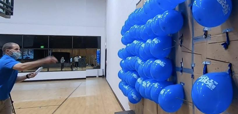Watch: Idaho man throws chopsticks to burst balloons, sets his 180th ...