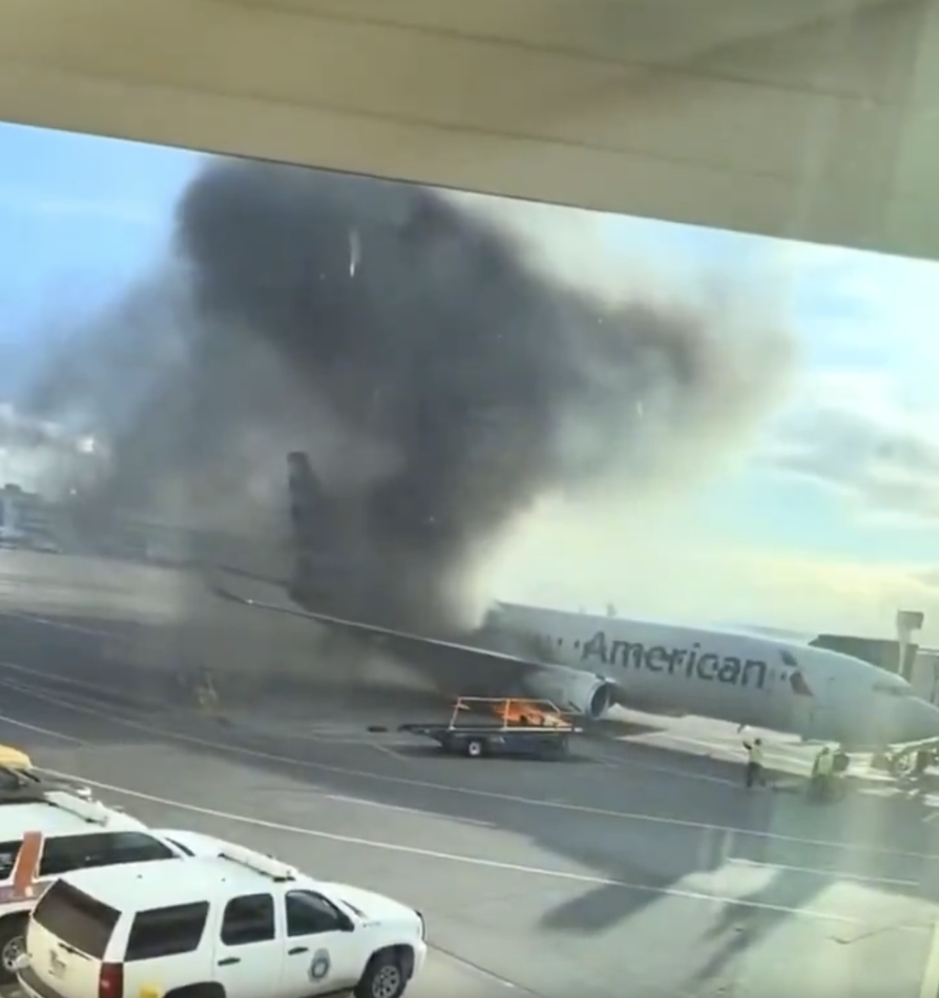 Watch: Fire erupts on American Airlines flight at Denver Airport ...